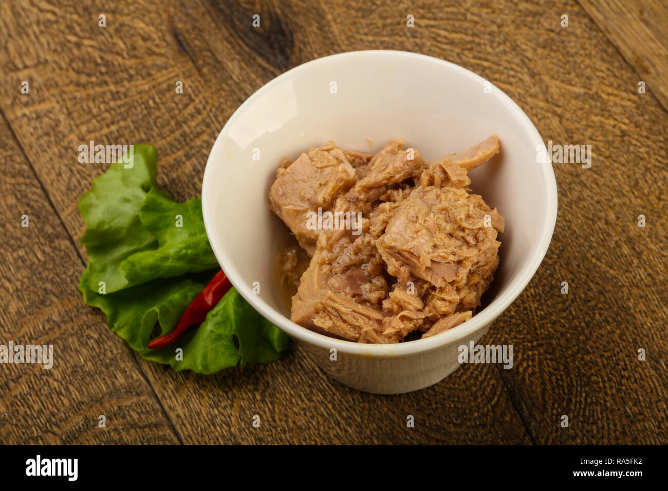Canned tuna fish in the bowl ready for cooking Stock Photo - Alamy