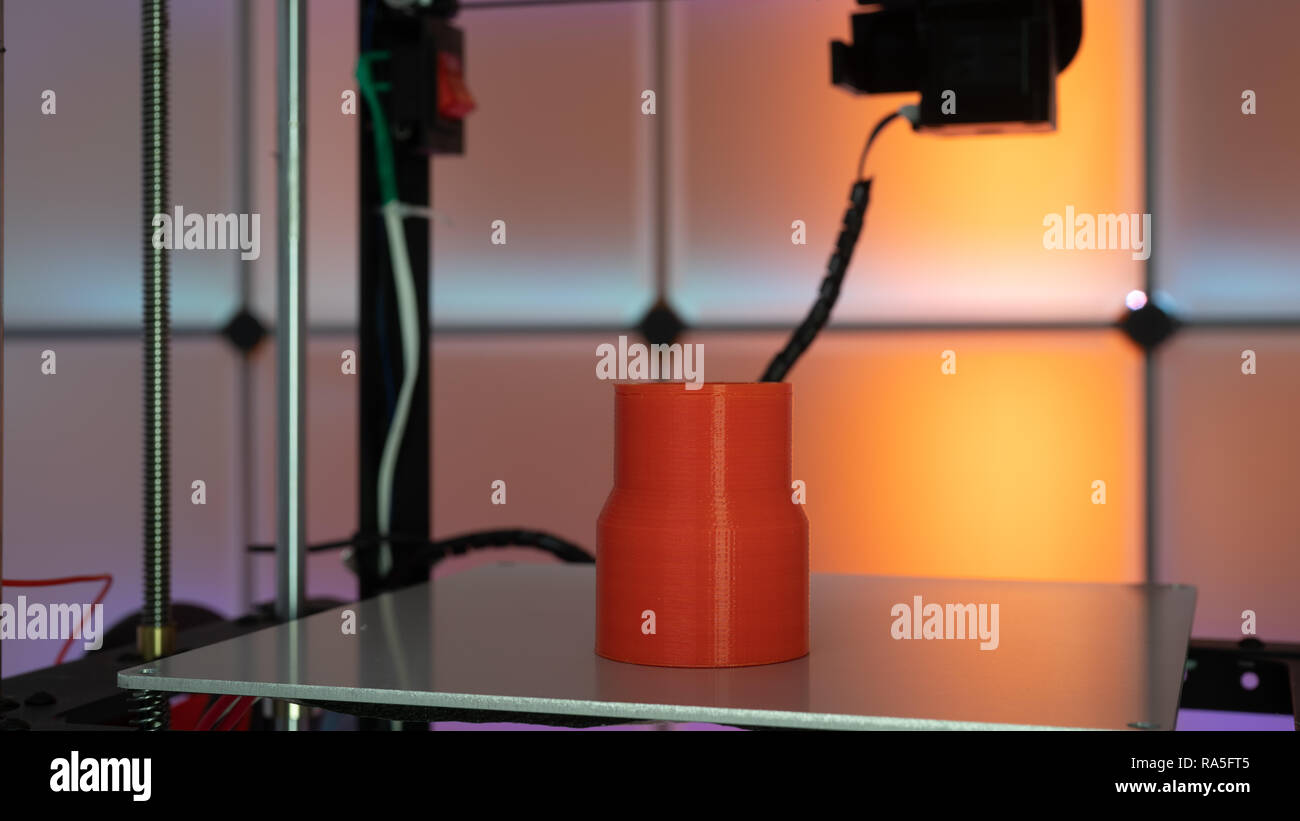 3d printer and plastic filament on color background Stock Photo - Alamy