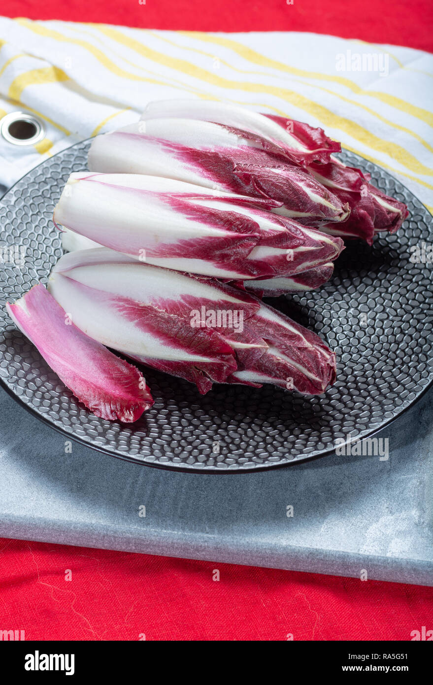 Group of fresh red Radicchio chicory or Belgian endive vegetables, also ...