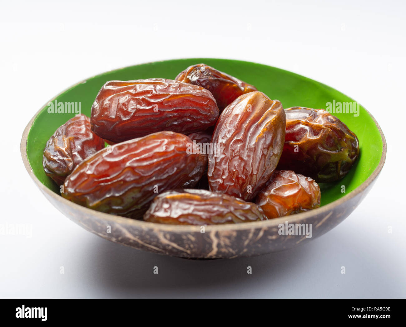 Pile medjool dates isolated hi-res stock photography and images - Alamy