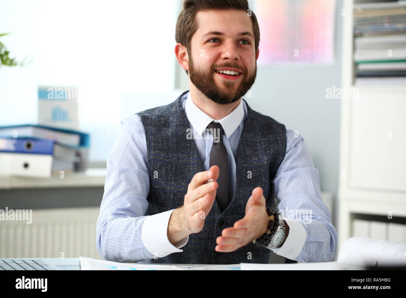 Man in suit clap his arms congrats for successful seminar Stock Photo ...