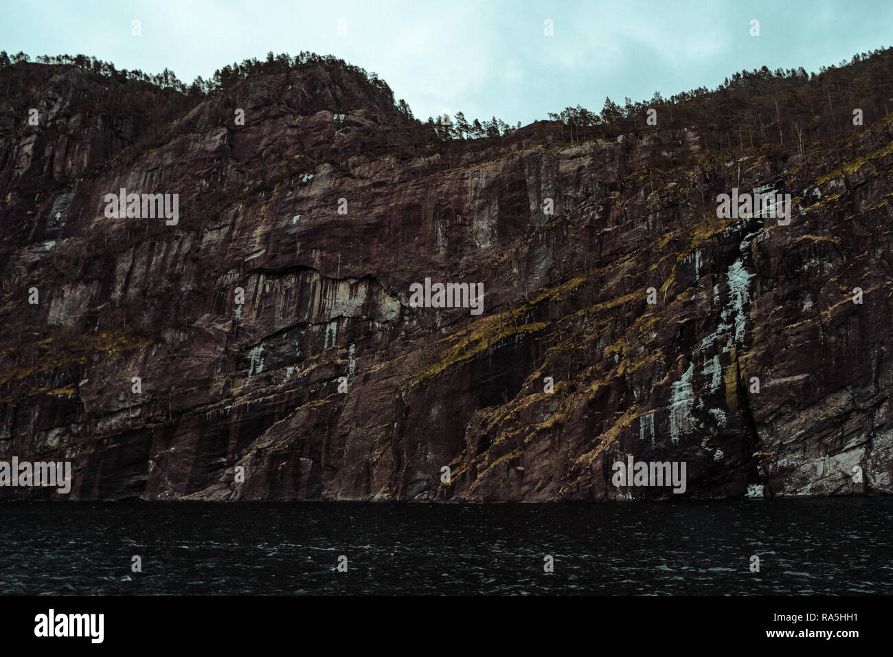 A cliff in Norway's fjords Stock Photo - Alamy