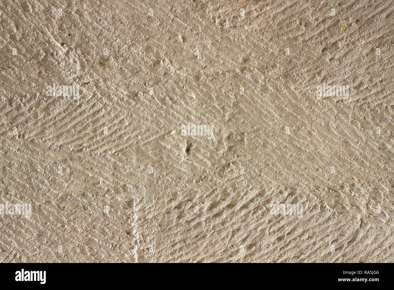Limestone surface in the quarry cave in Fertorakos, Hungary. The ...