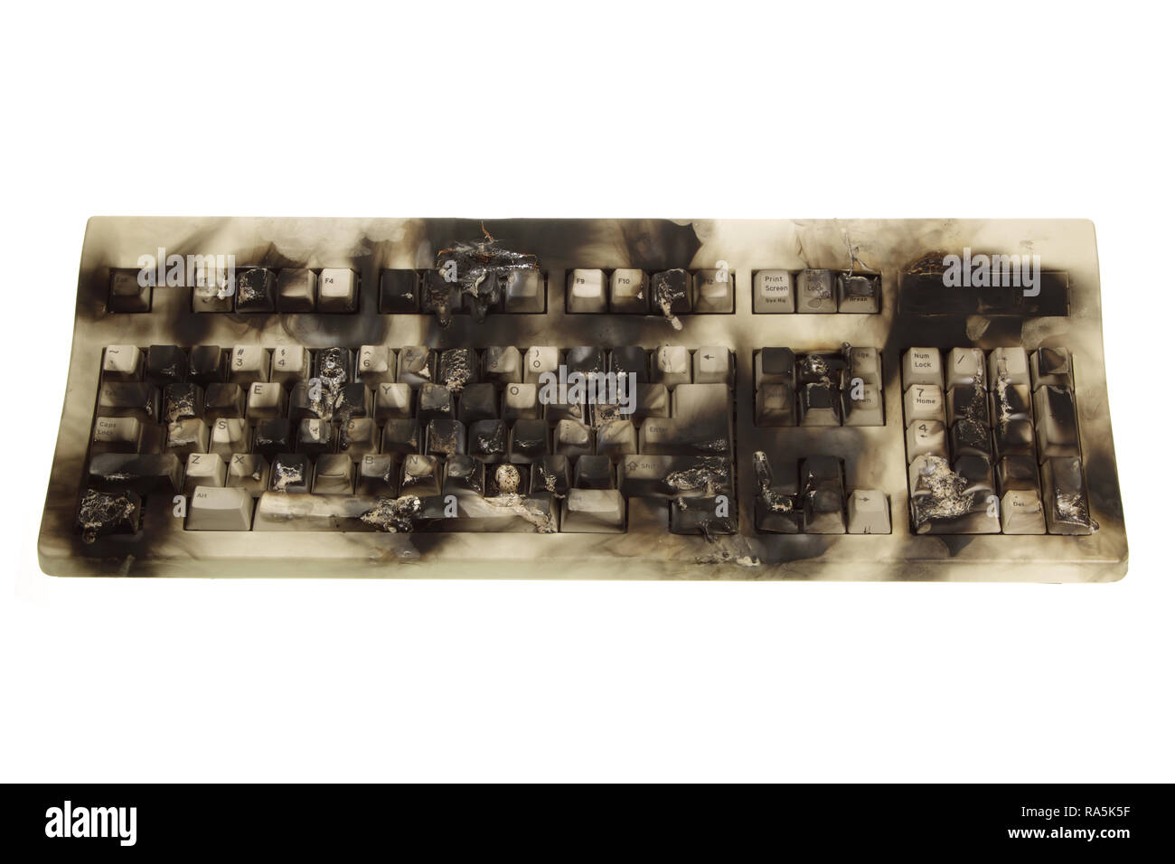 Burnt Computer Keyboard on White Background Stock Photo - Alamy