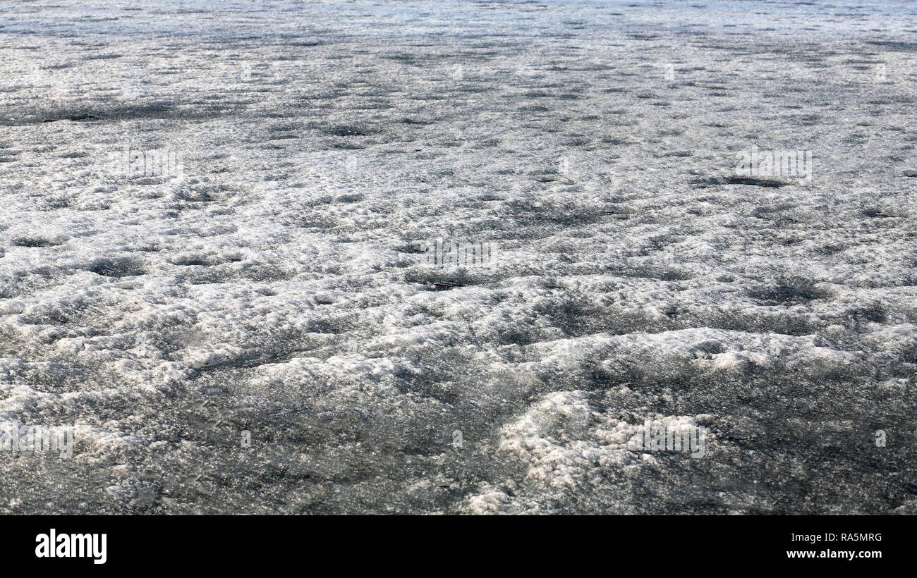last spring ice on pond Stock Photo - Alamy
