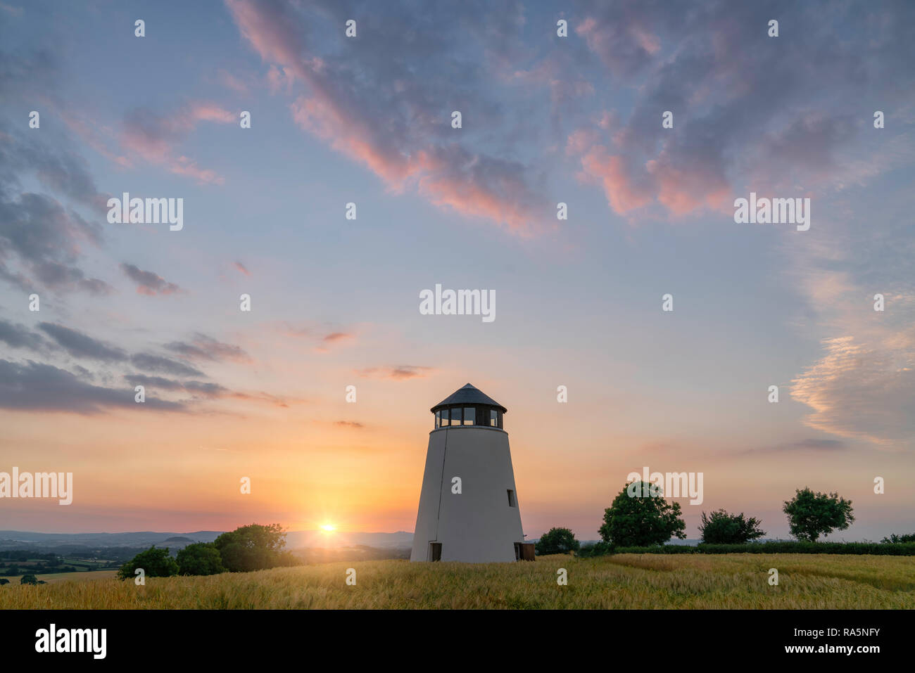 Long Barrow Windmill Stock Photo - Alamy