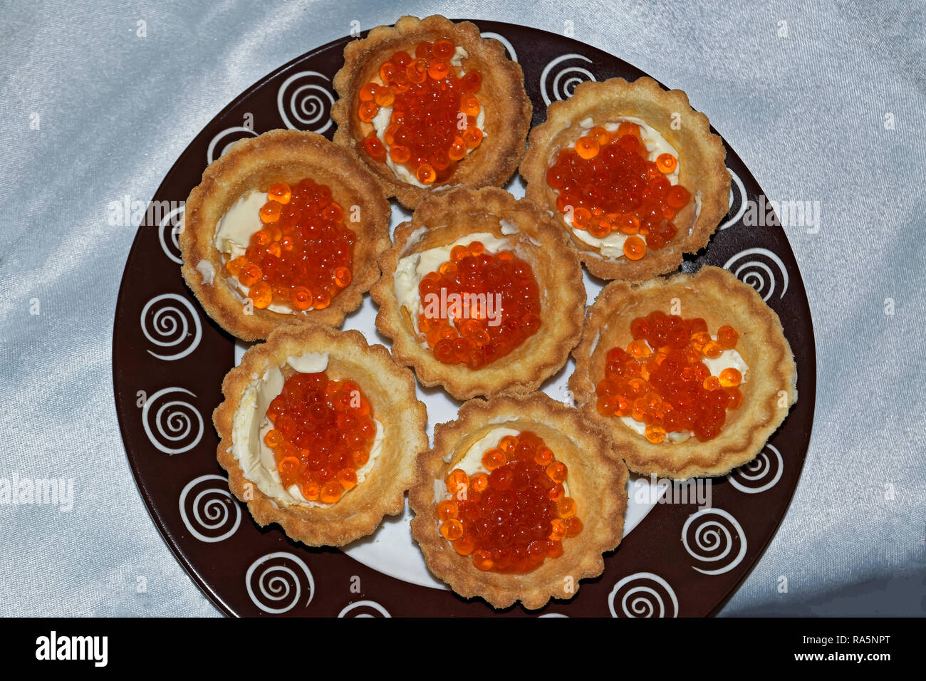 Tartlets with red caviar close up. Close-up salmon caviar. Delicatessen ...