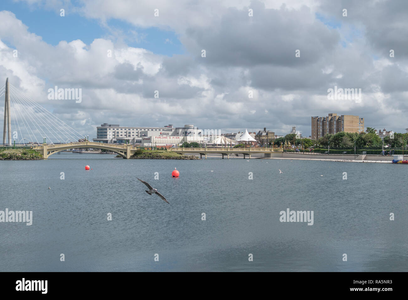 View across Marine Lake from Southport Central Pier to Funland Stock ...