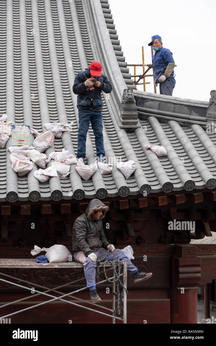 XI'AN, SHAANXI, CHINA - DECEMBER 8, 2018 : View of Chinese workers ...