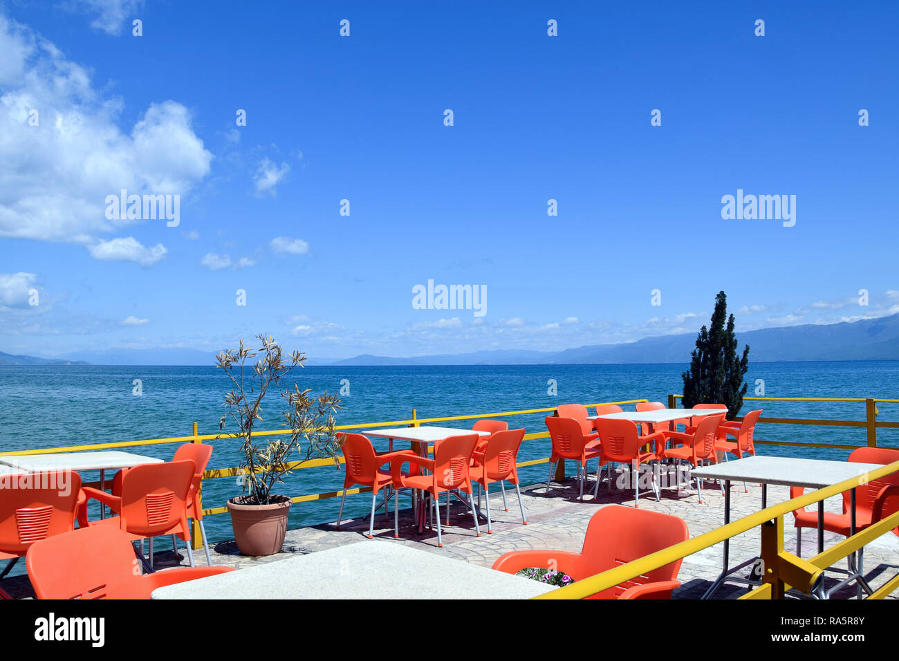 Ohrid coastline with restaurant tables, with beautiful landscape of ...