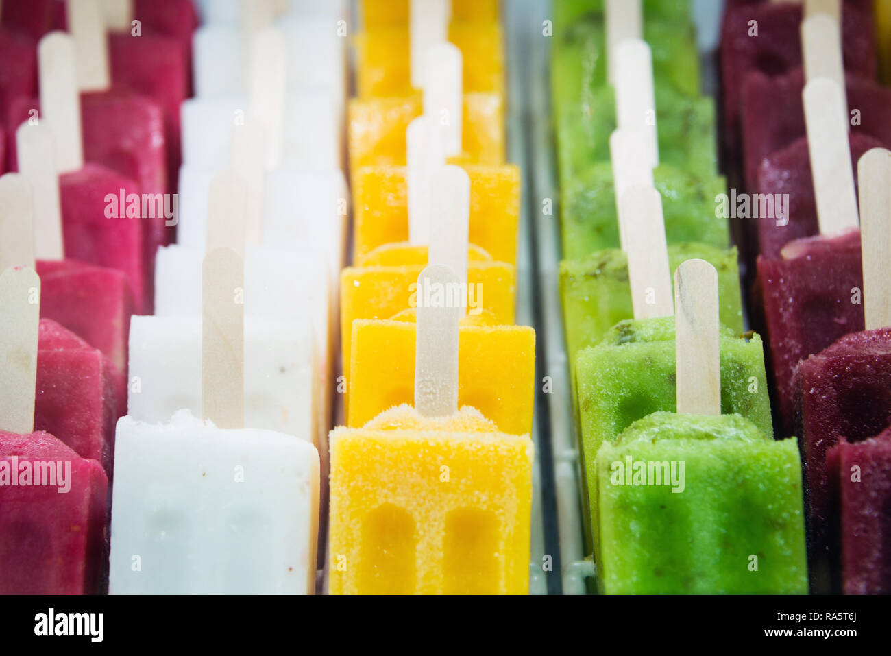 Group of refreshing fruit popsicle in a row Stock Photo - Alamy