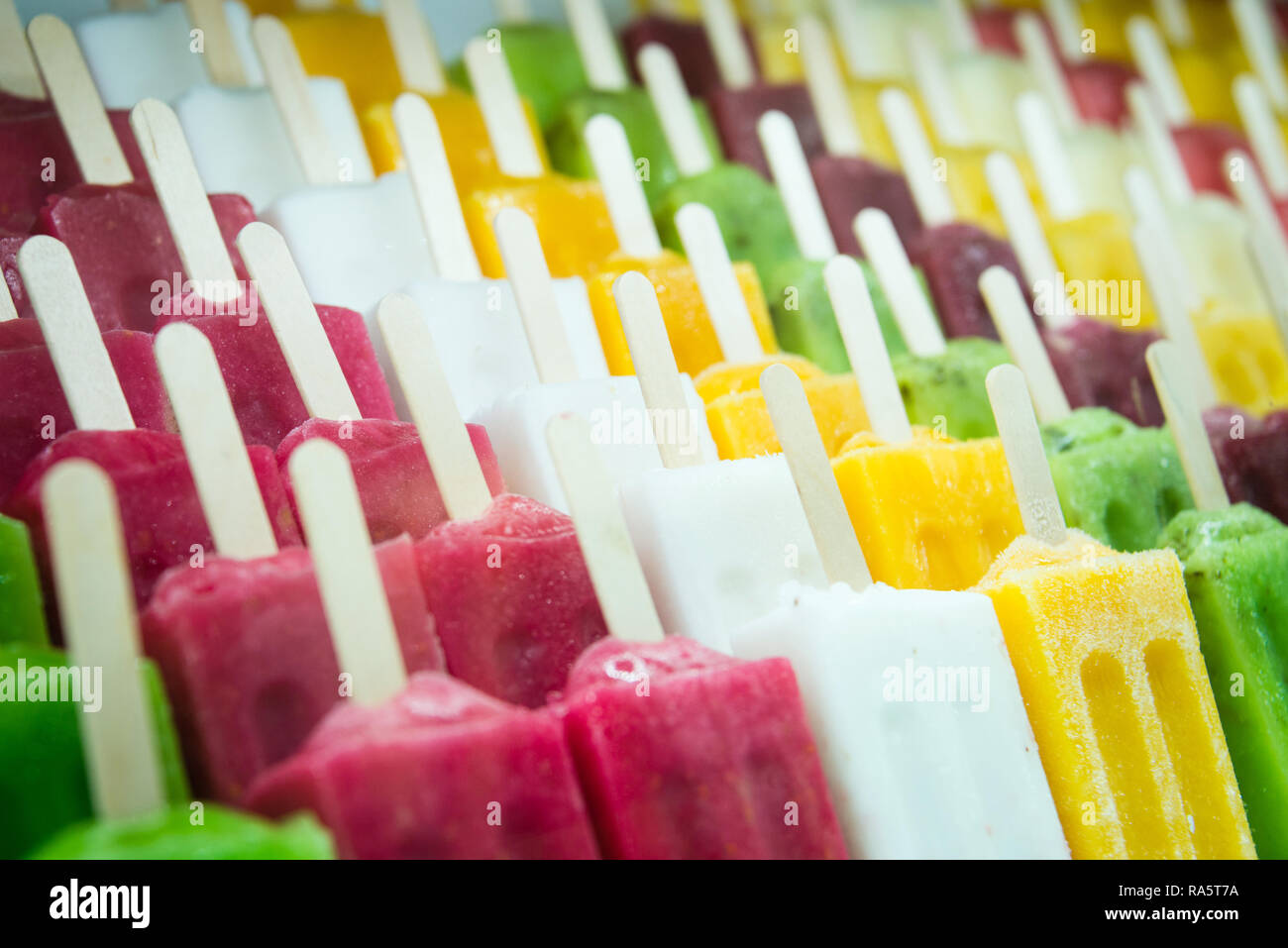 Group of refreshing fruit popsicle in a row Stock Photo - Alamy