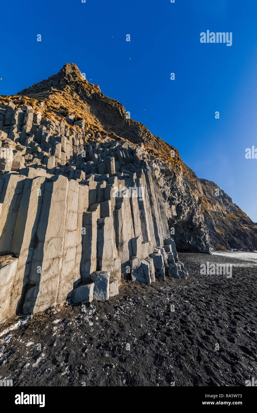 Columnar basalt formations along Reynisfjara Black Sand Beach in ...