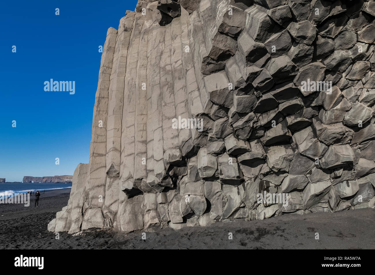 Columnar basalt formations along Reynisfjara Black Sand Beach, with ...