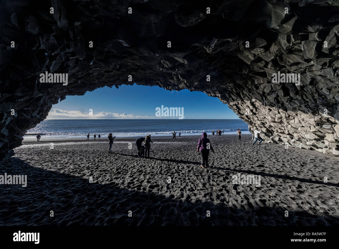 Sea cave created from wave action on the basalt cliffs of Reynisfjara ...