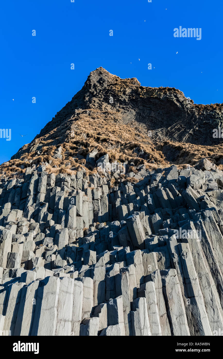 Columnar basalt formations along Reynisfjara Black Sand Beach in ...