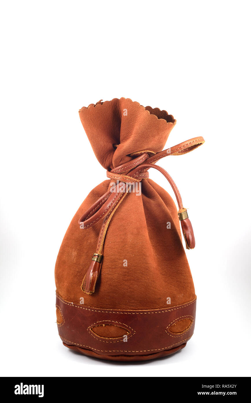 brown suede pouch on white background, vertical Stock Photo - Alamy