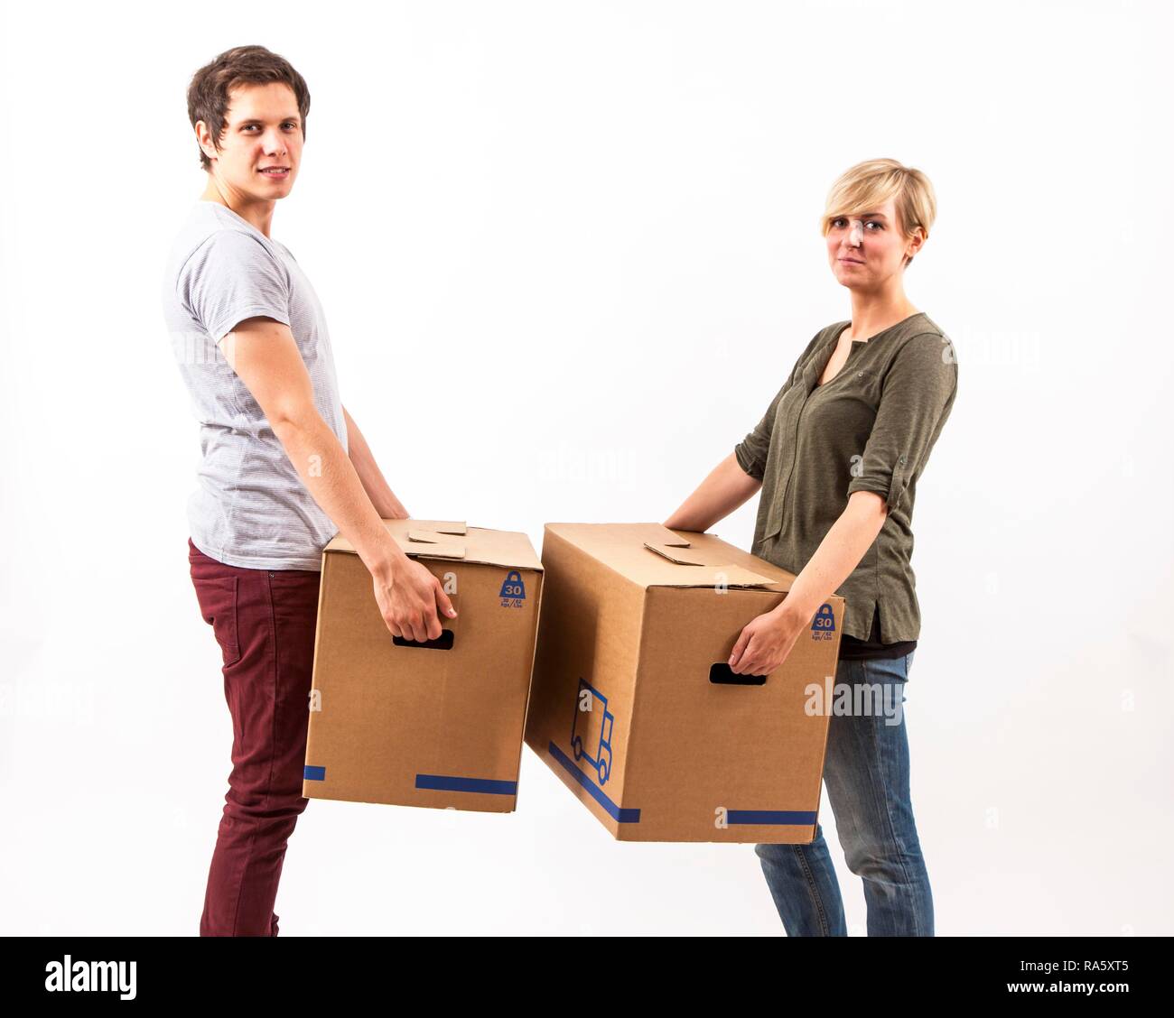Carrying moving boxes hi-res stock photography and images - Alamy