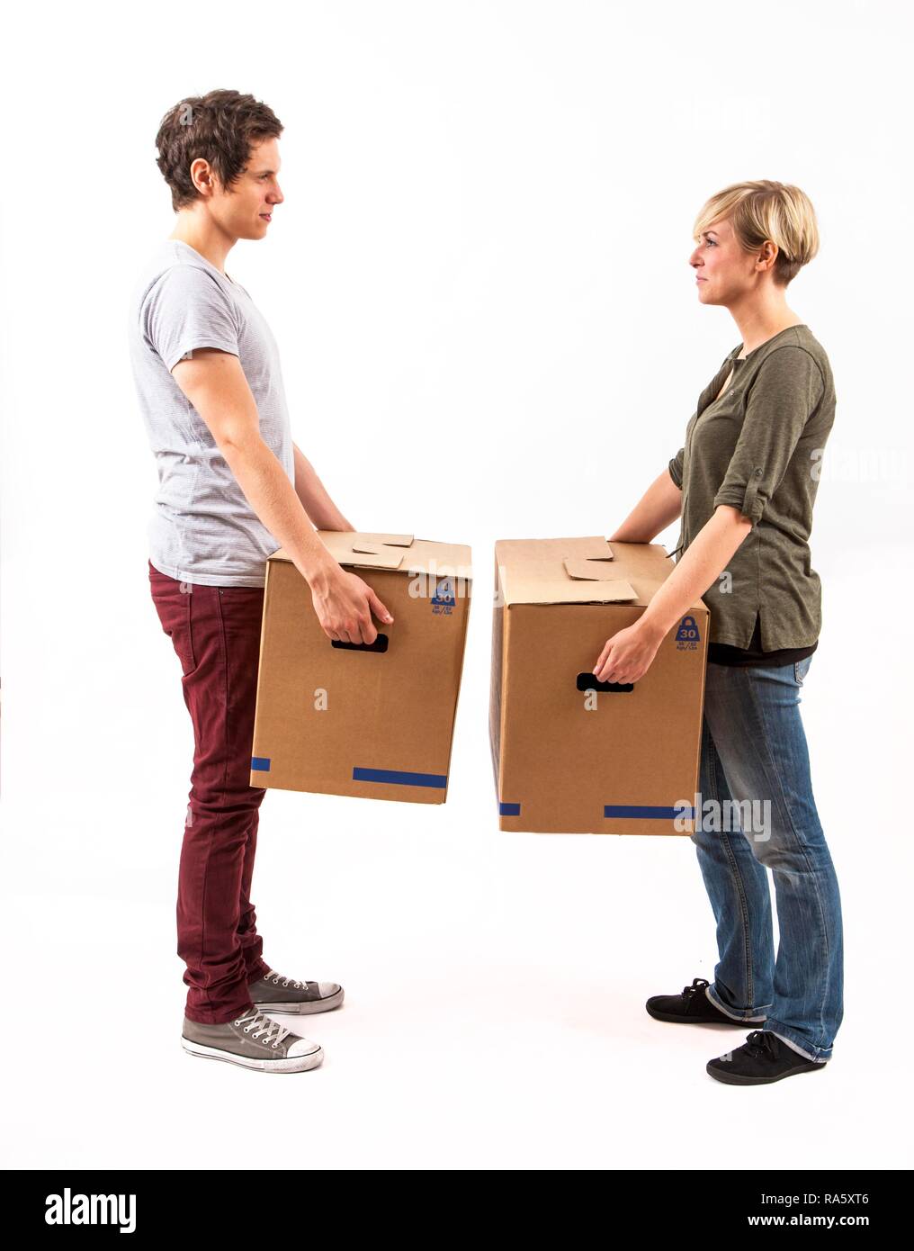 Carrying moving boxes hi-res stock photography and images - Alamy