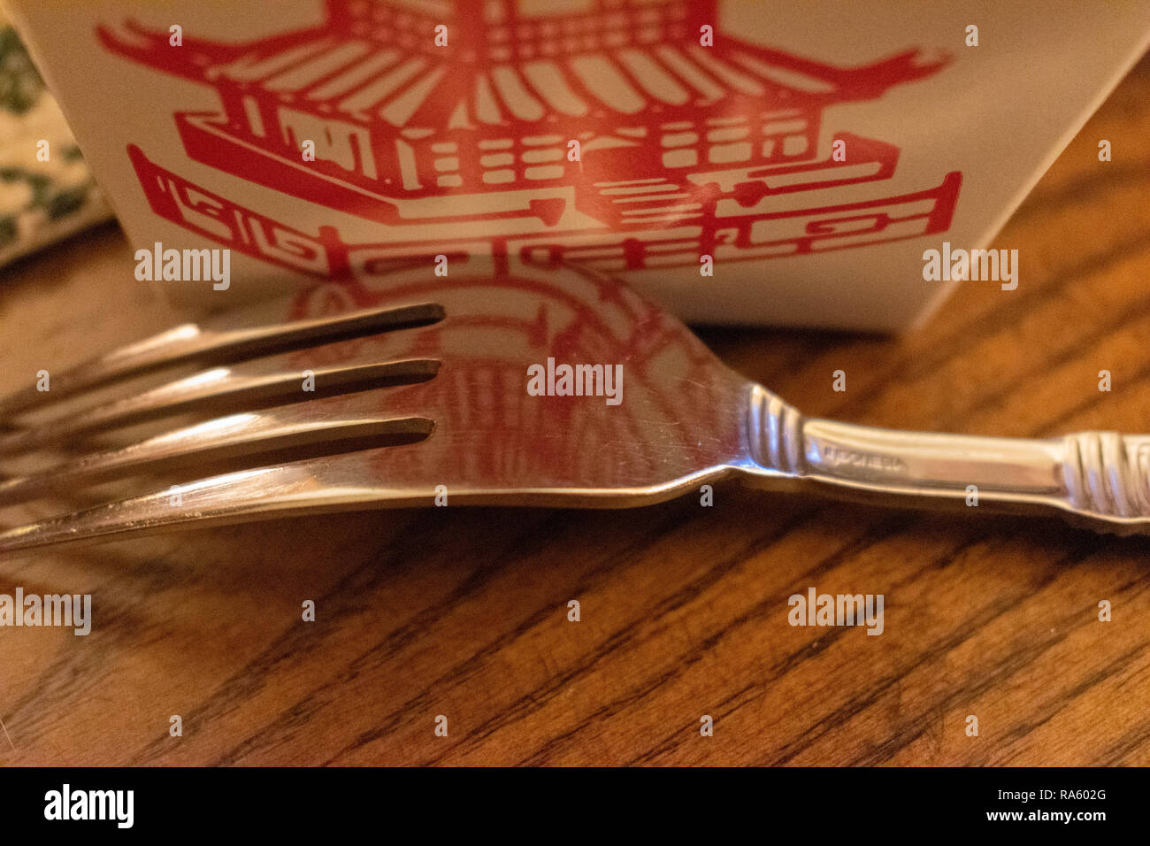 Chinese Food Reflection on Fork Stock Photo - Alamy
