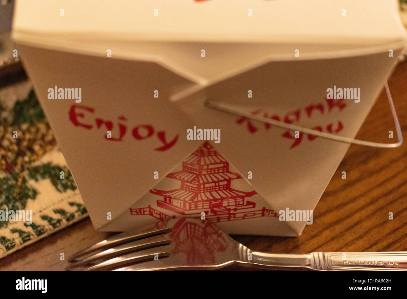 Chinese food reflection on fork Stock Photo - Alamy