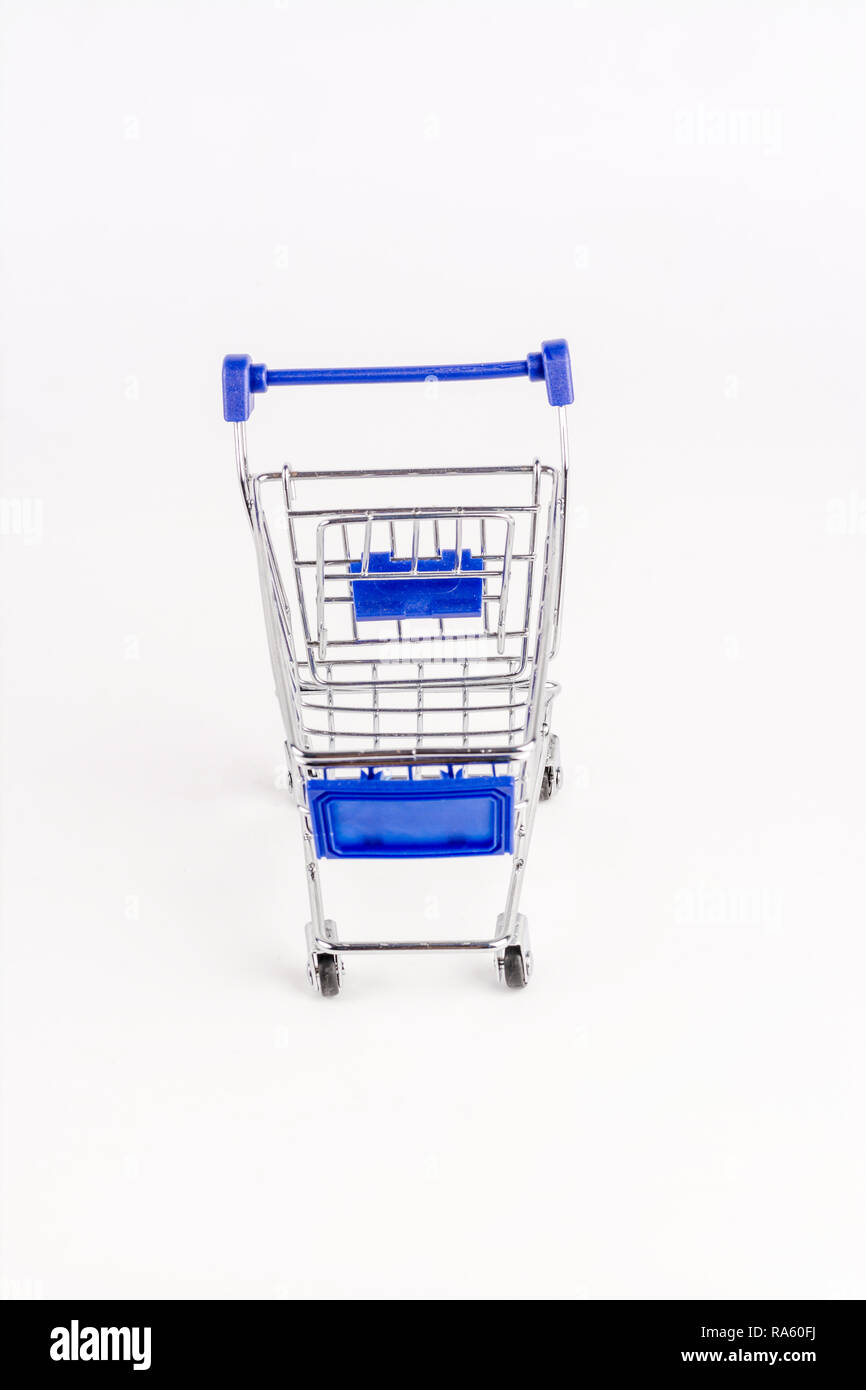 Shopping cart on white background Stock Photo - Alamy