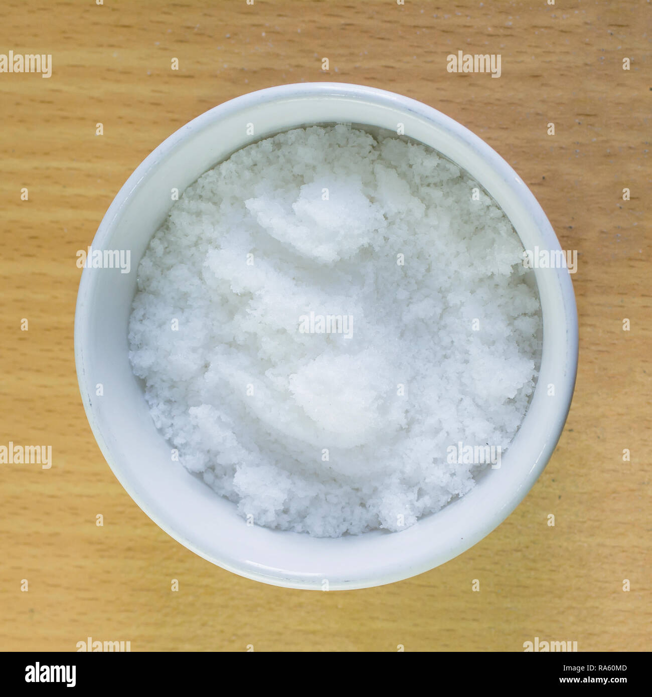 Salt in cup Stock Photo - Alamy
