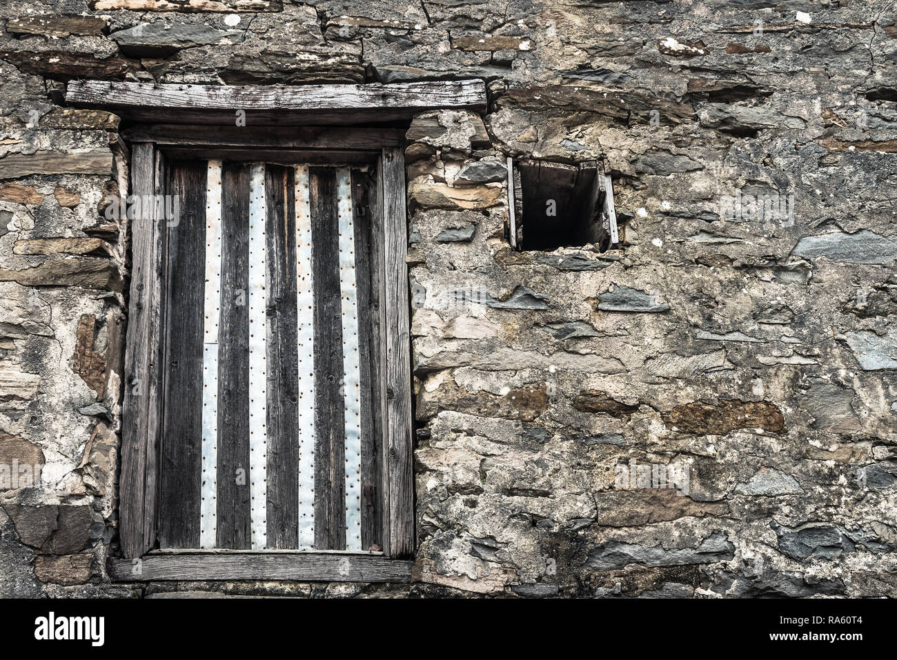 Old medieval castle stone wall texture under natural light with boarded ...