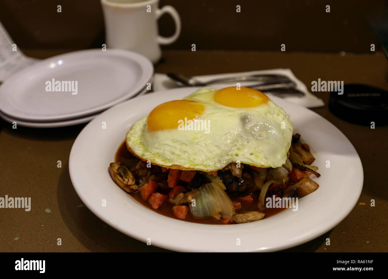 Loco Moco , traditional Hawaiian cuisine , burger patty on rice with a ...