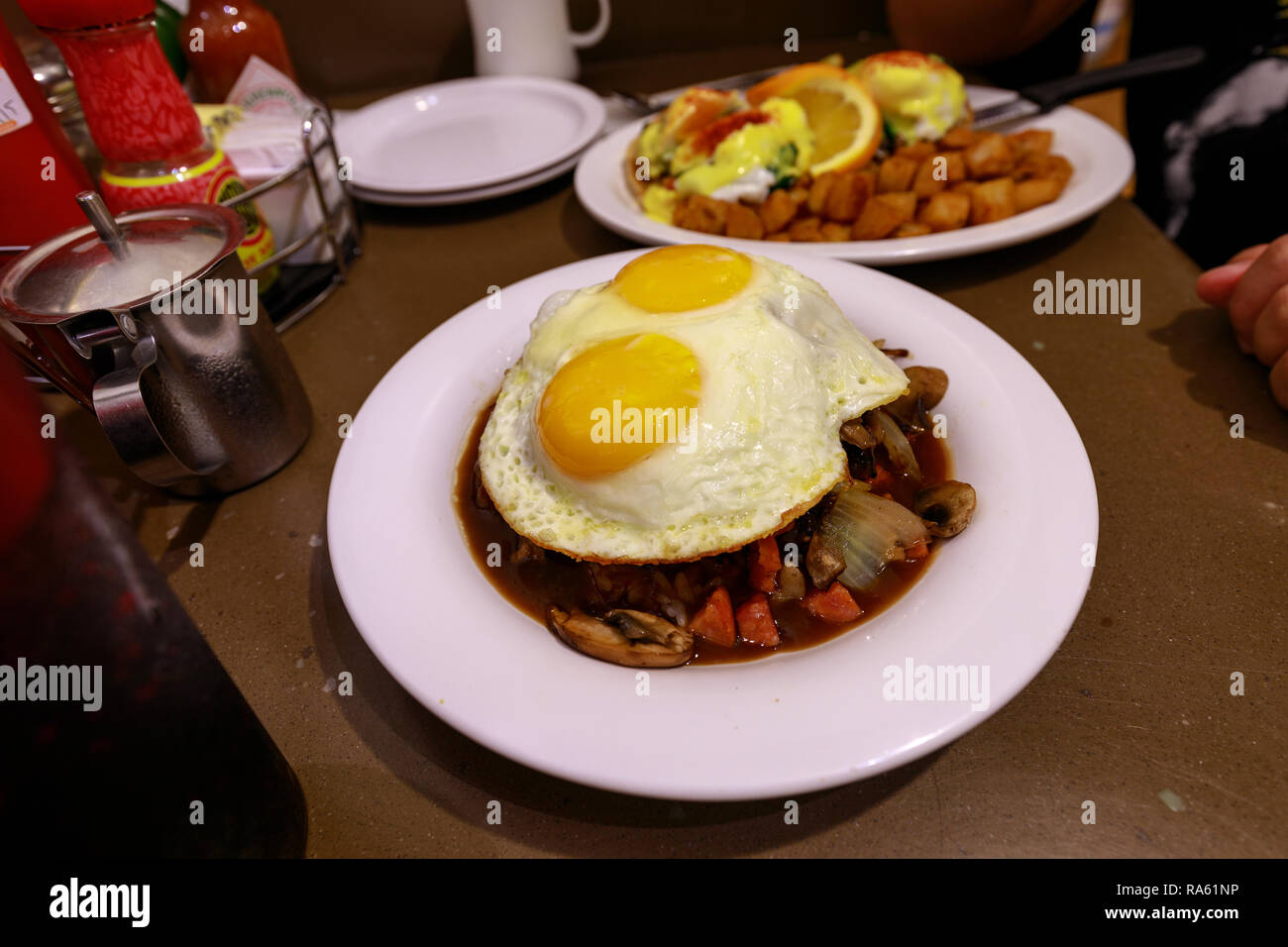 Loco Moco , traditional Hawaiian cuisine , burger patty on rice with a ...