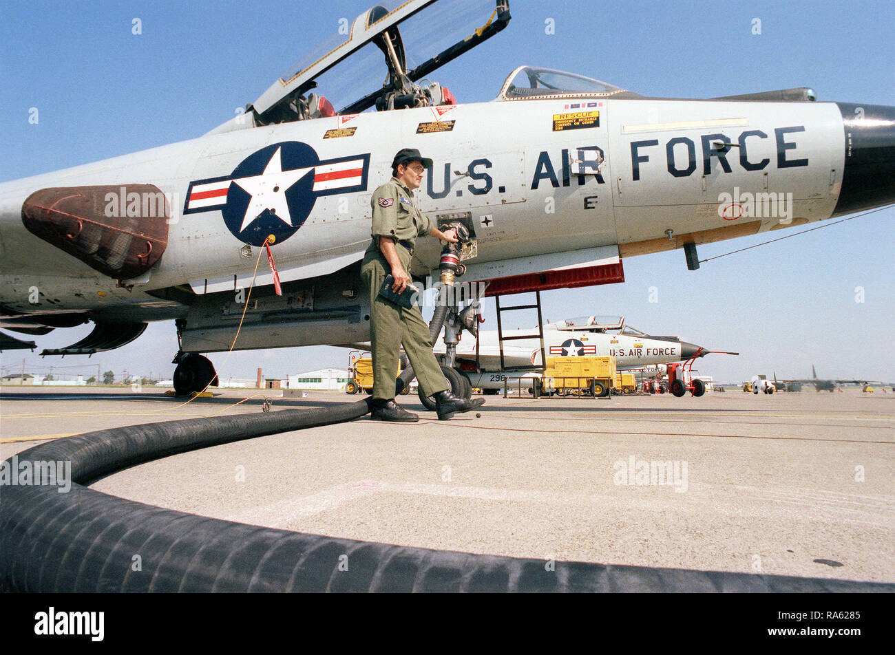 1978 - A staff sergeant refuels an F-101 Voodoo aircraft from a fuel ...
