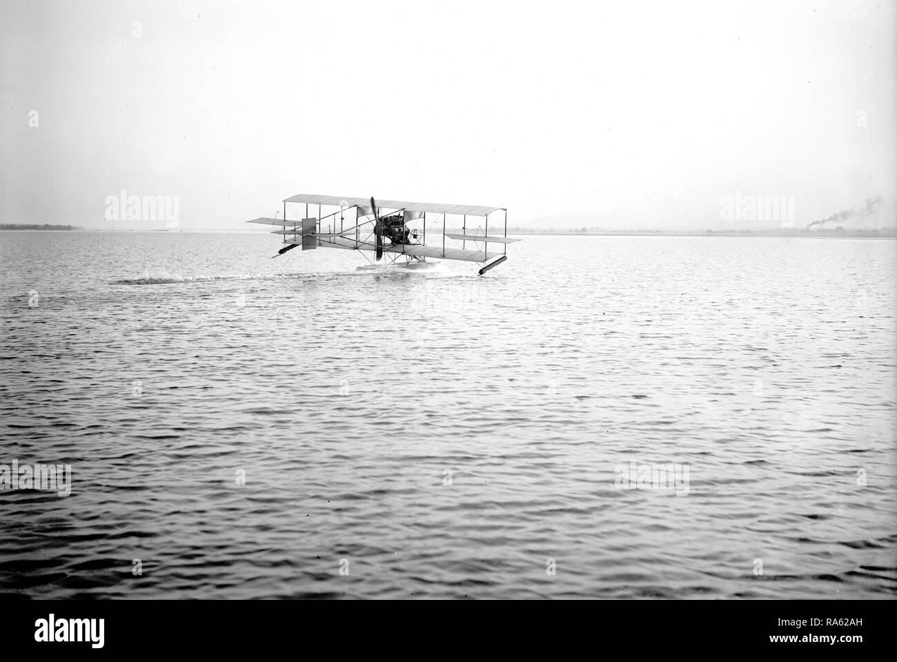 U.S. Navy Lieutenant Theodore Ellyson testing a seaplane on the Potomoc ...
