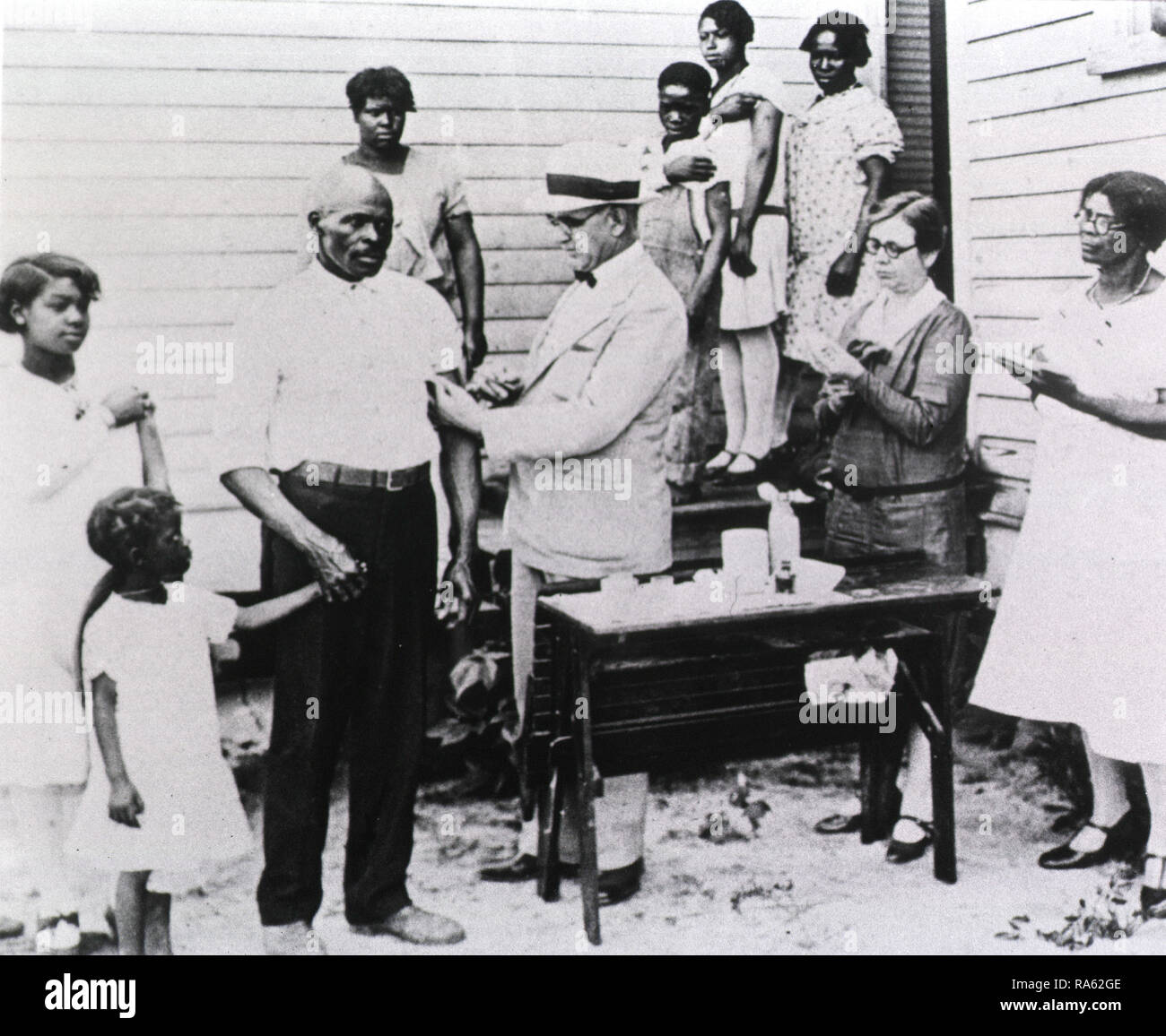 Family receives inoculations against typhoid fever ca. 1930s Stock ...