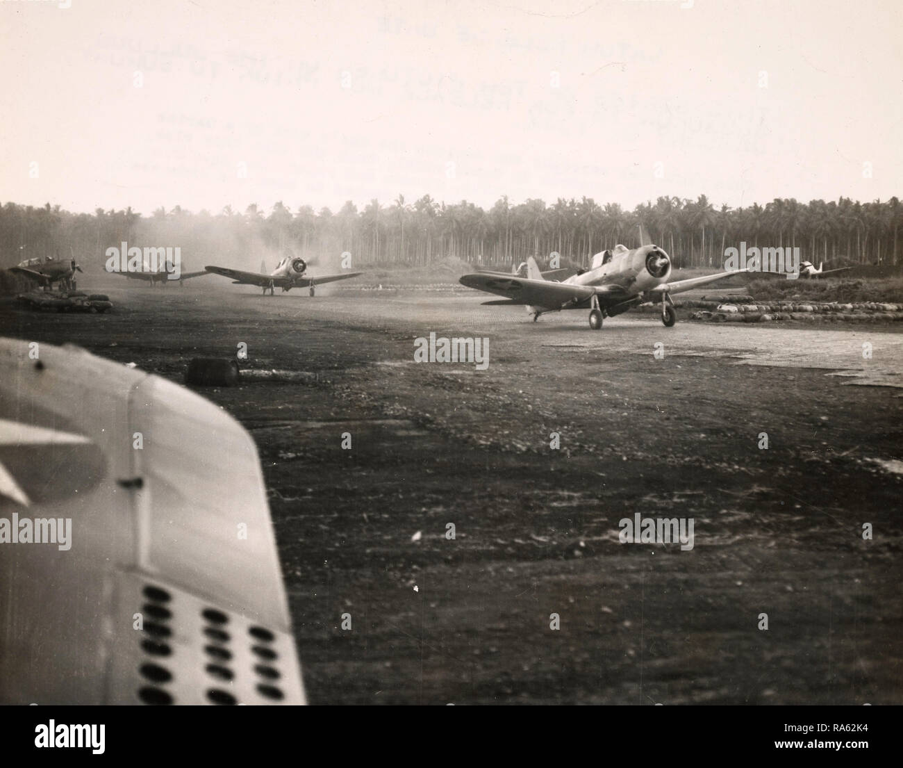 WWII Photos - Marine Corps planes of the "Bulldog Squadron" taxi down ...