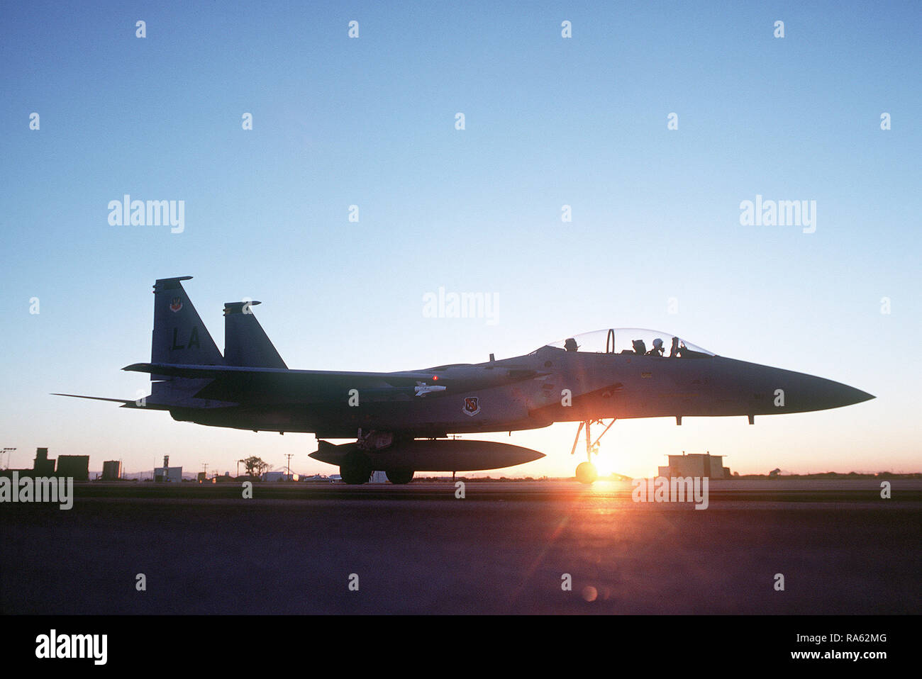 1979 - A right side view of an F-15 Eagle aircraft, silhouetted against ...
