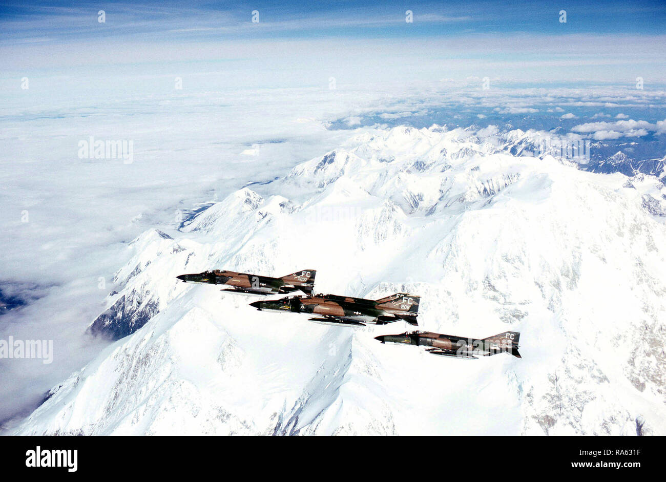 1978 - An air-to-air left side view of four F-4E Phantom II aircraft in ...