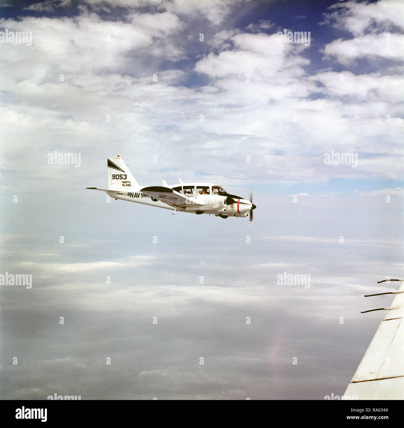 1976 - An air-to-air right side view of a U-11A Aztec aircraft near San ...