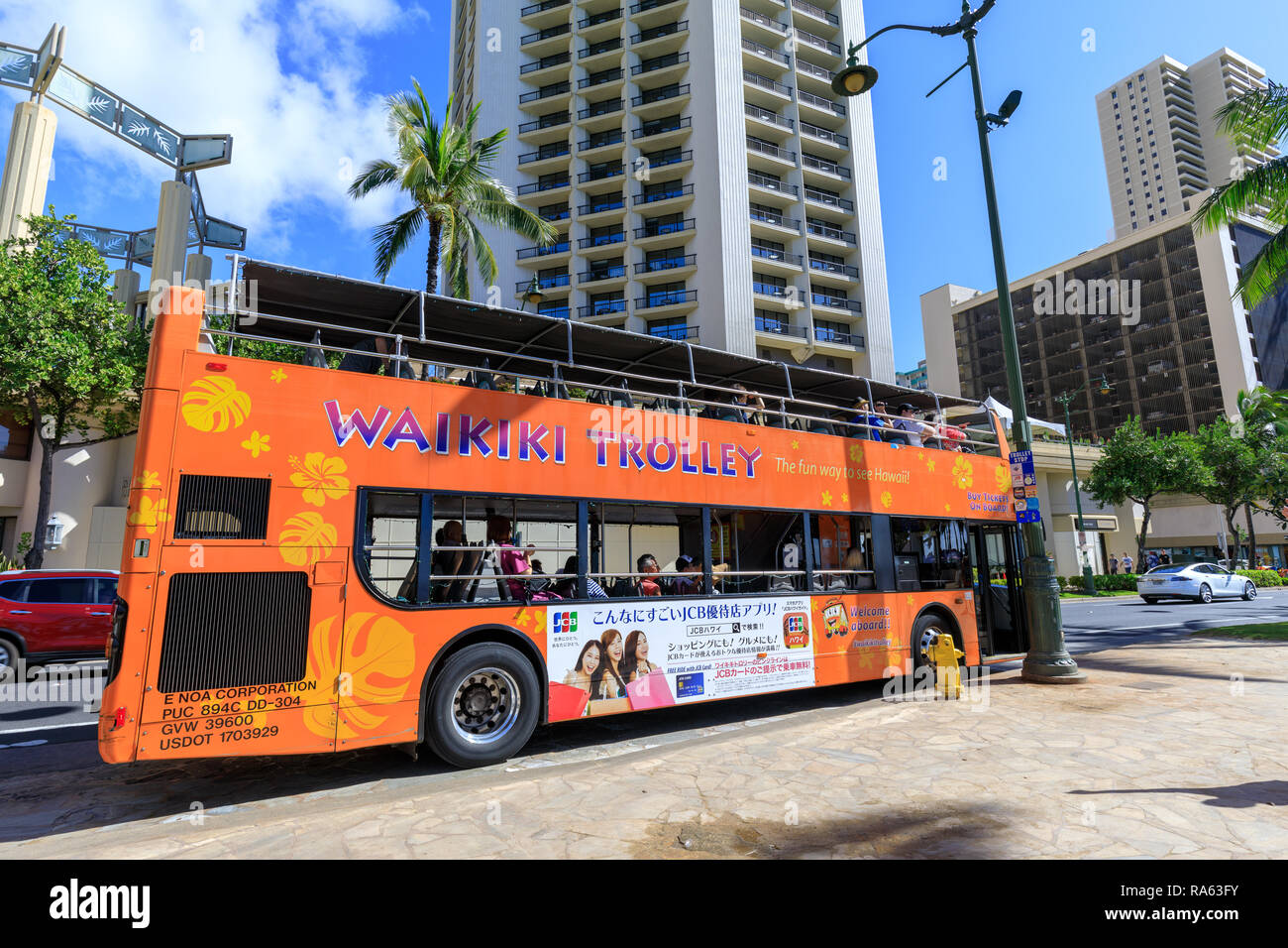 Honolulu, Hawaii - Dec 23, 2018 : Waikiki Trolley bus on Kalakaua avenue, Waikiki beach Stock ...