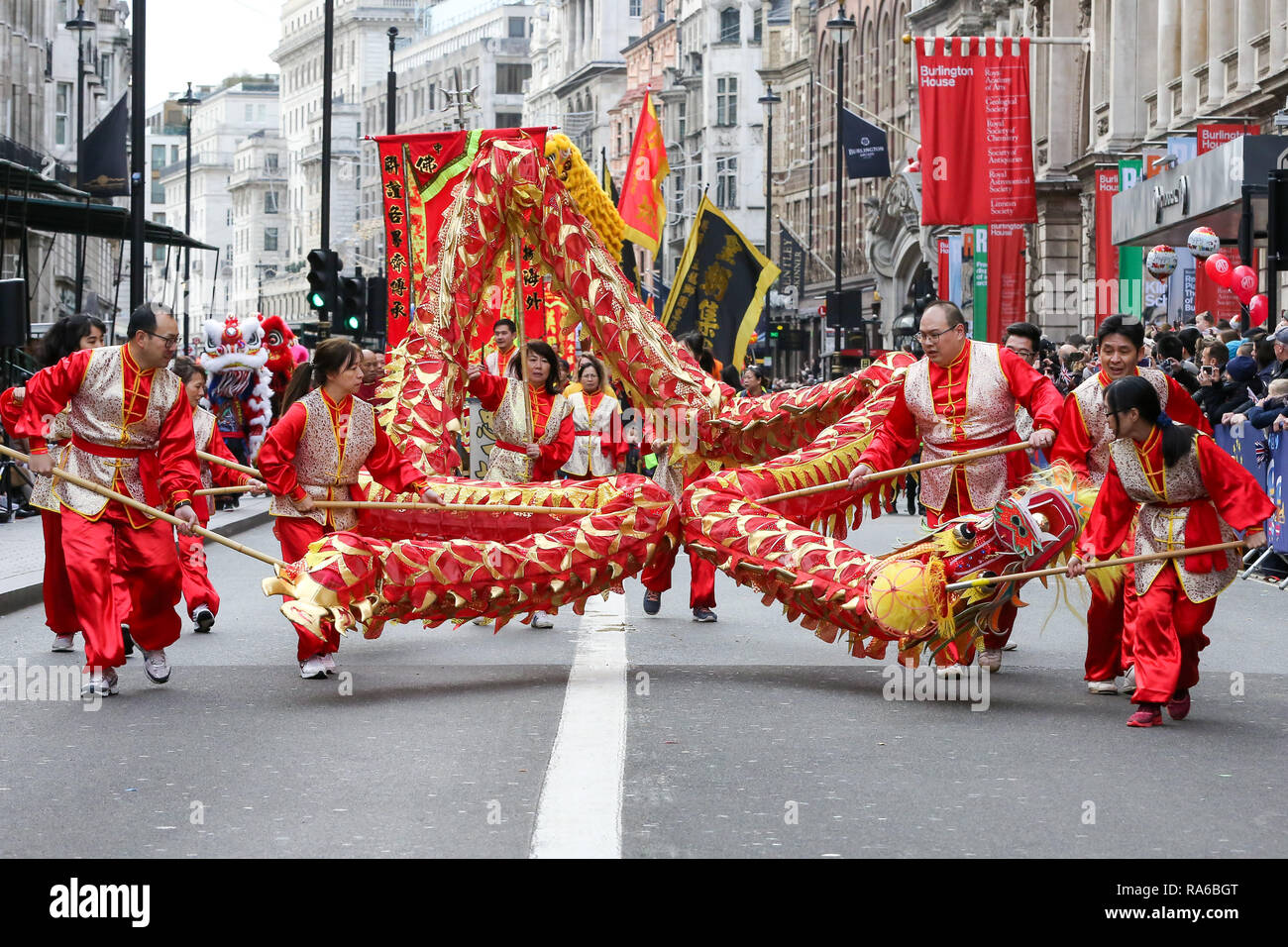 Performers seen with Chinese dragons during the parade. Over half a ...