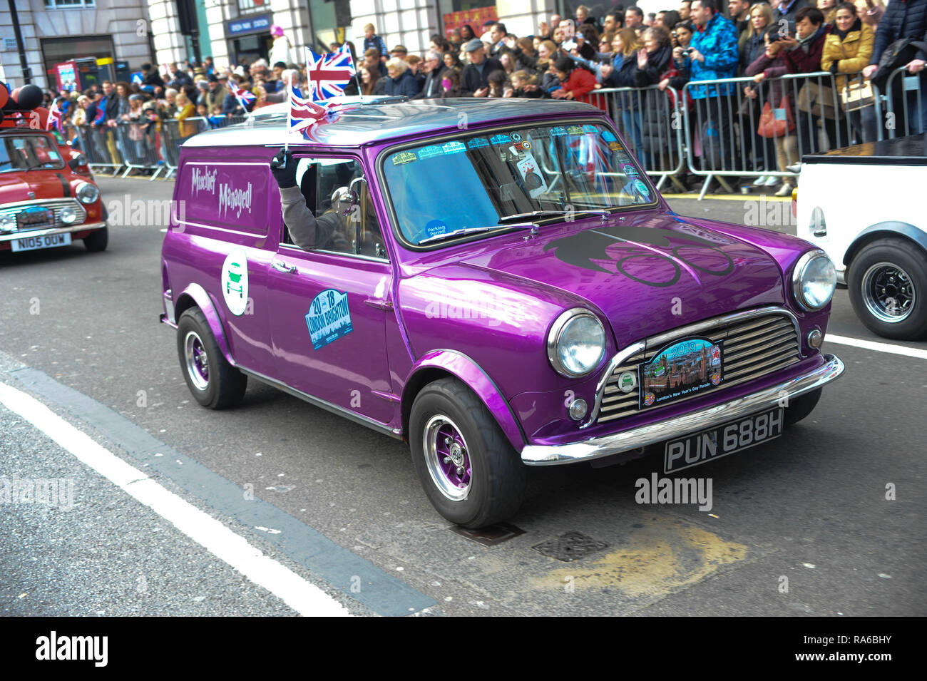 A Mini Austin vintage car takes part in a parade during London's New ...