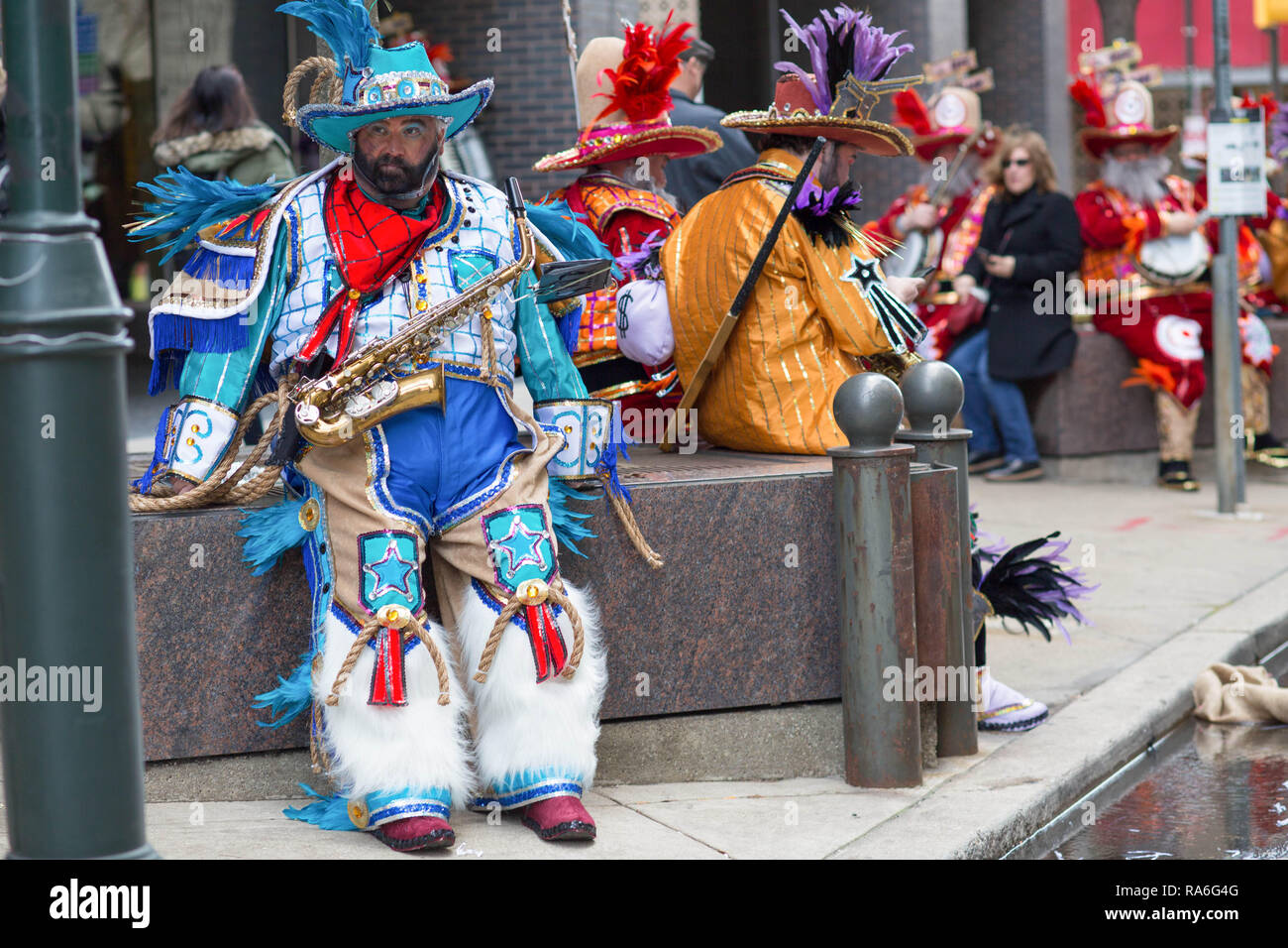 Performers prepare themselves for the Philadelphia Mummers Parade, a ...