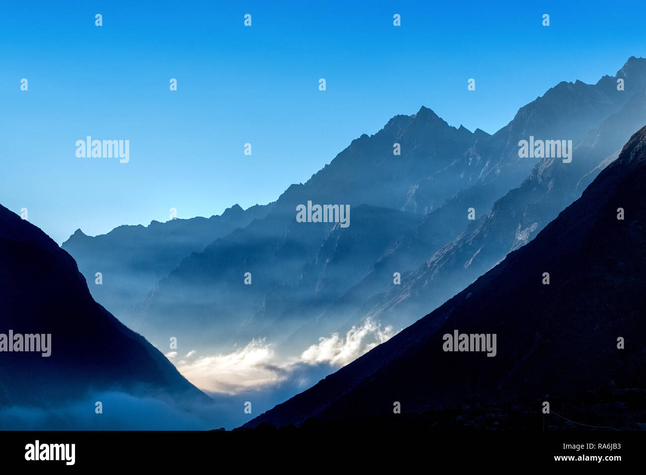 Misty mountain valley, Langtang Himalayas, Nepal Stock Photo - Alamy