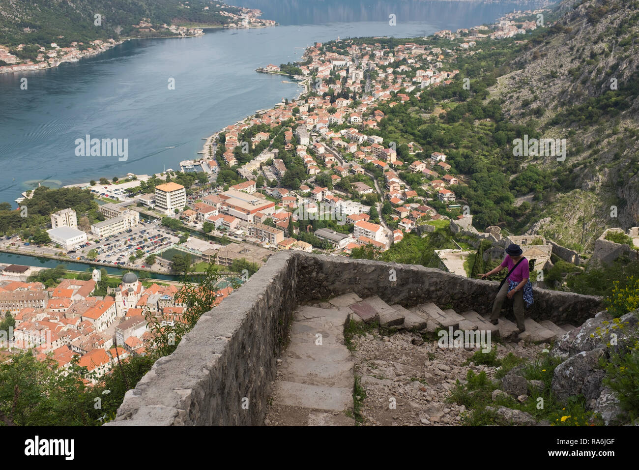 Tourists and visitors walk the path and stairs climbing to the ...