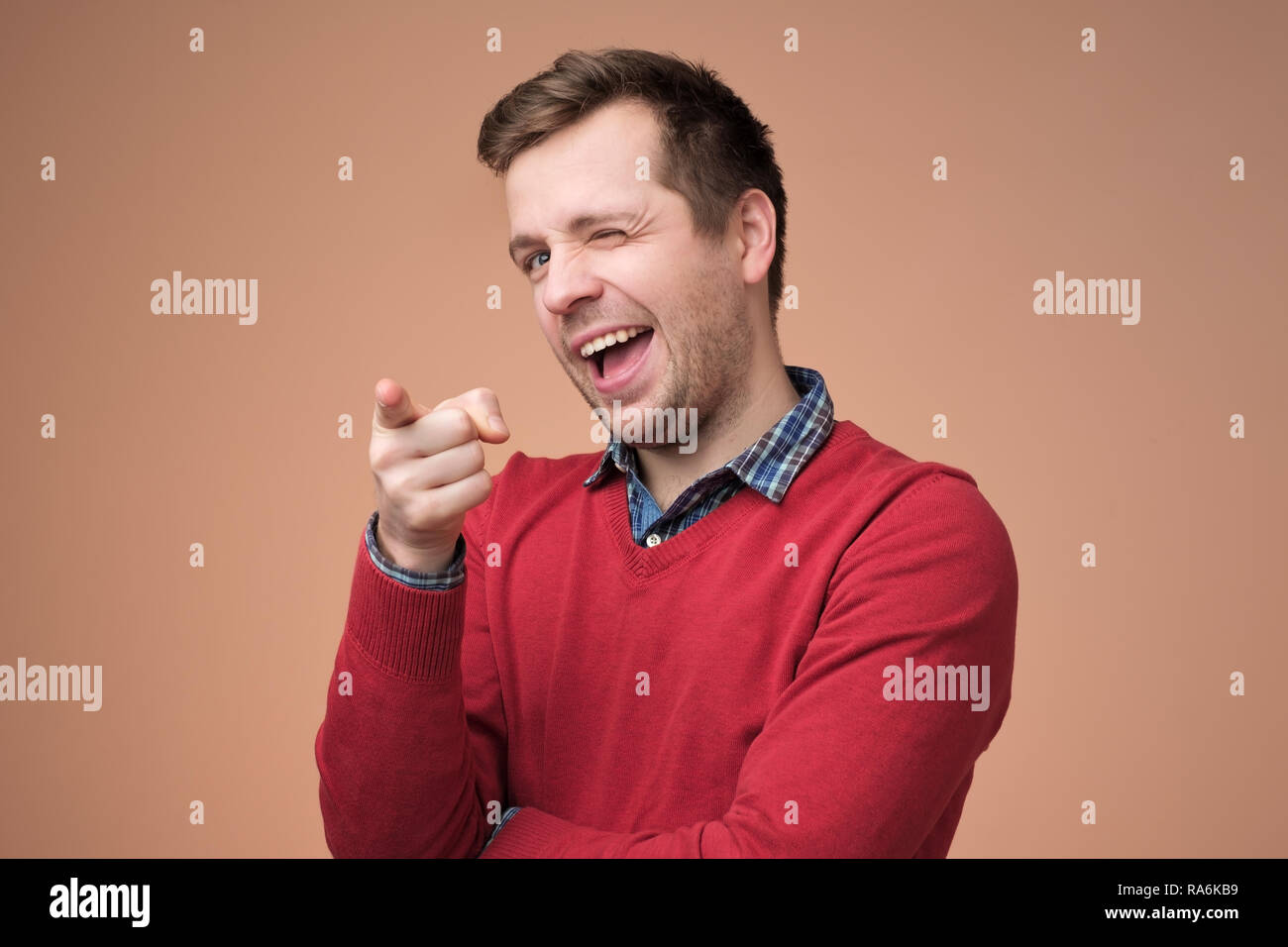 Guy with bristle smiling and expressing positive emotions while ...