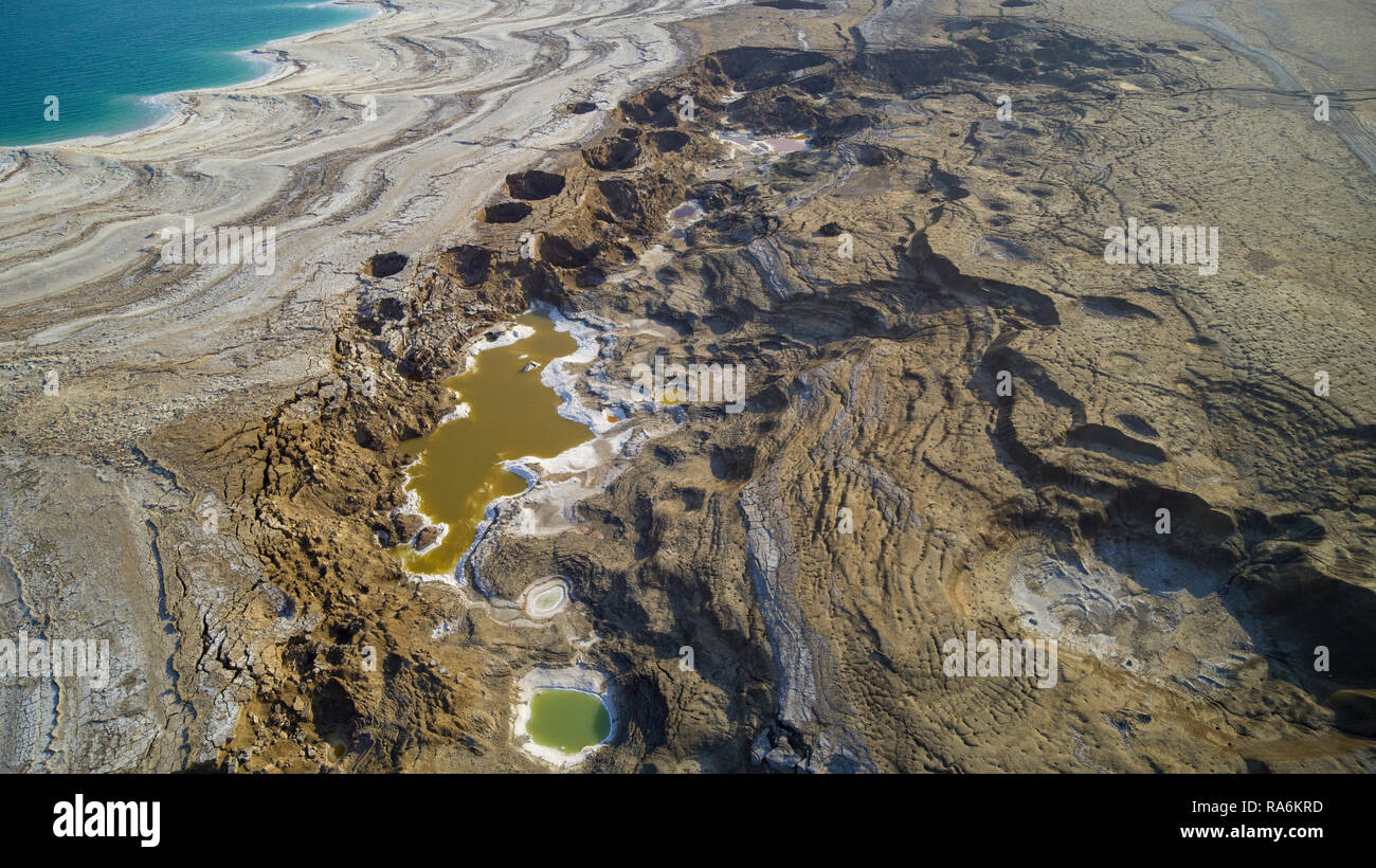 Aerial Photography with a drone. Elevated view of sink holes on the ...