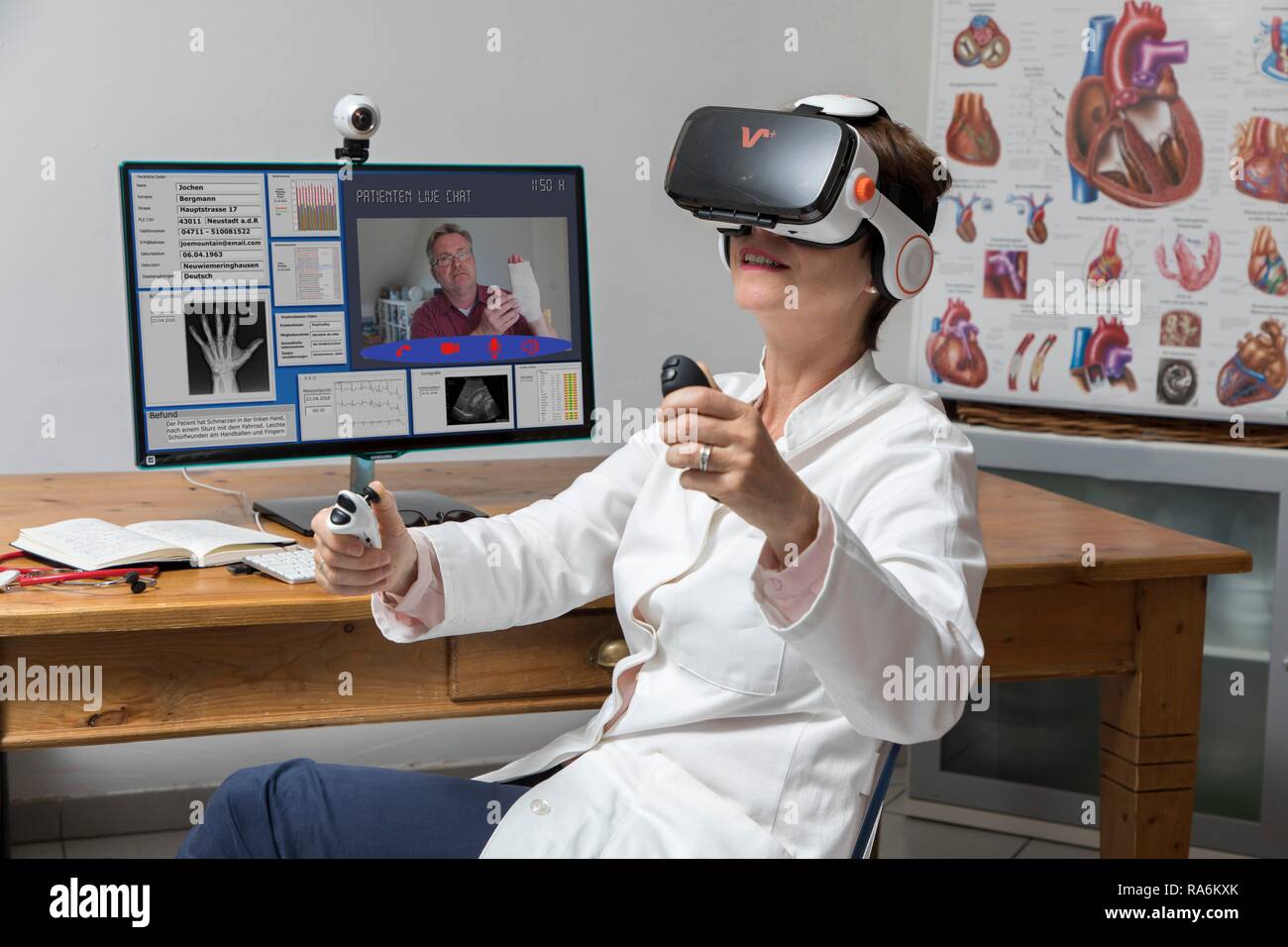Symbol photo for telemedicine, doctor in a practice, with VR glasses ...