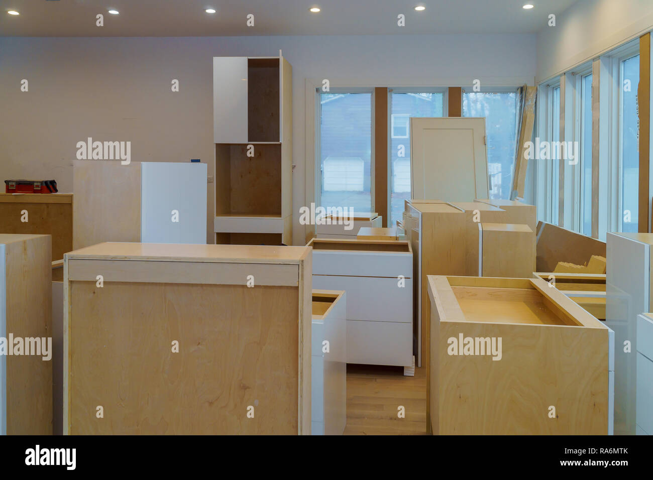 Installing new induction hob in modern kitchen kitchen Installation of ...