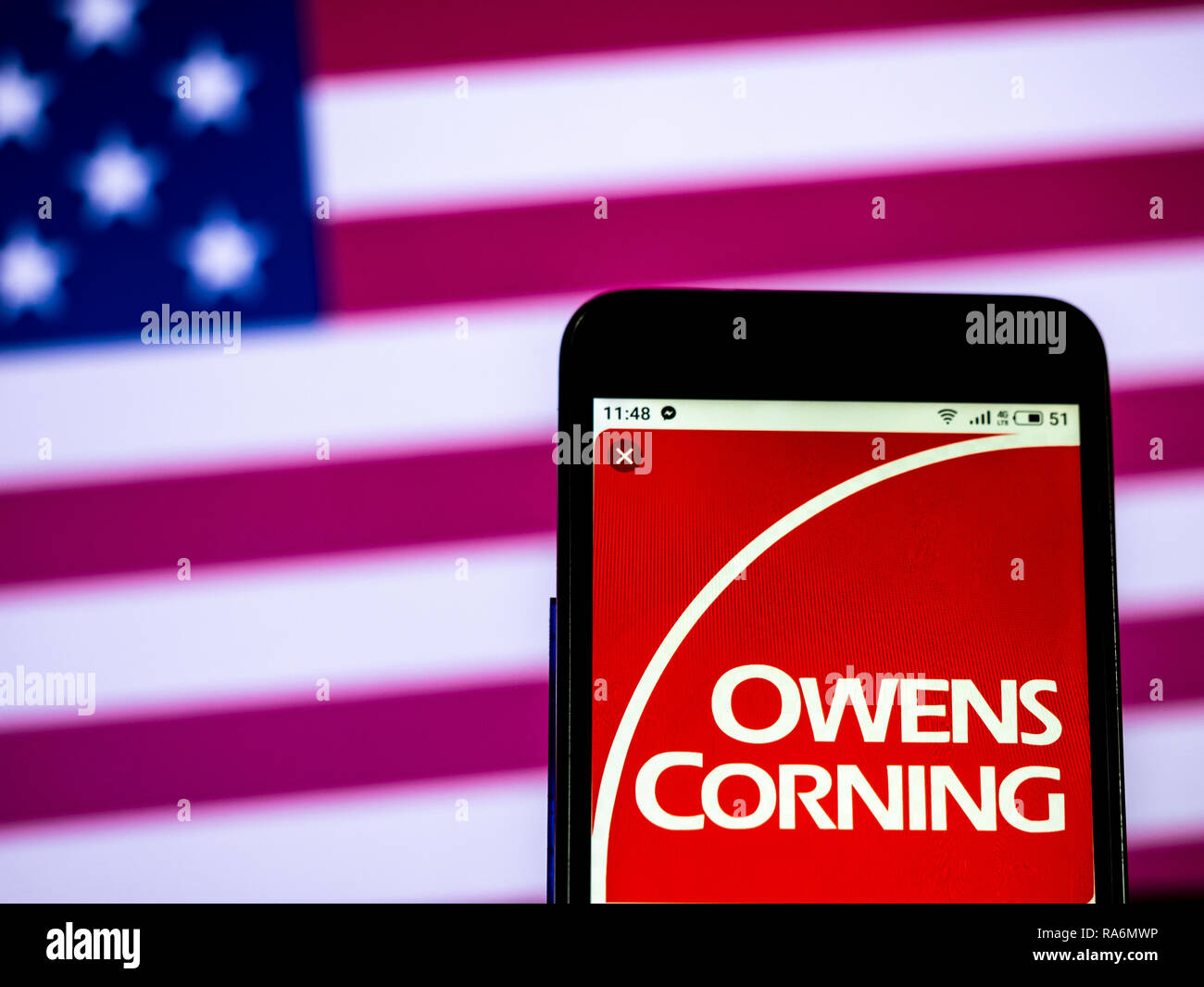 Owens Corning Company logo seen displayed on smart phone Stock Photo ...