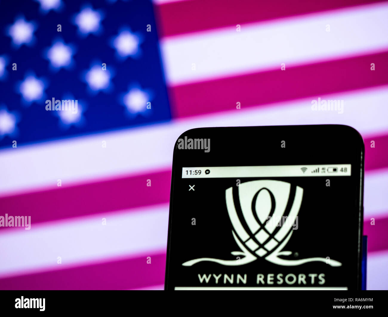 Wynn Resorts Casino hotel company logo seen displayed on smart phone ...