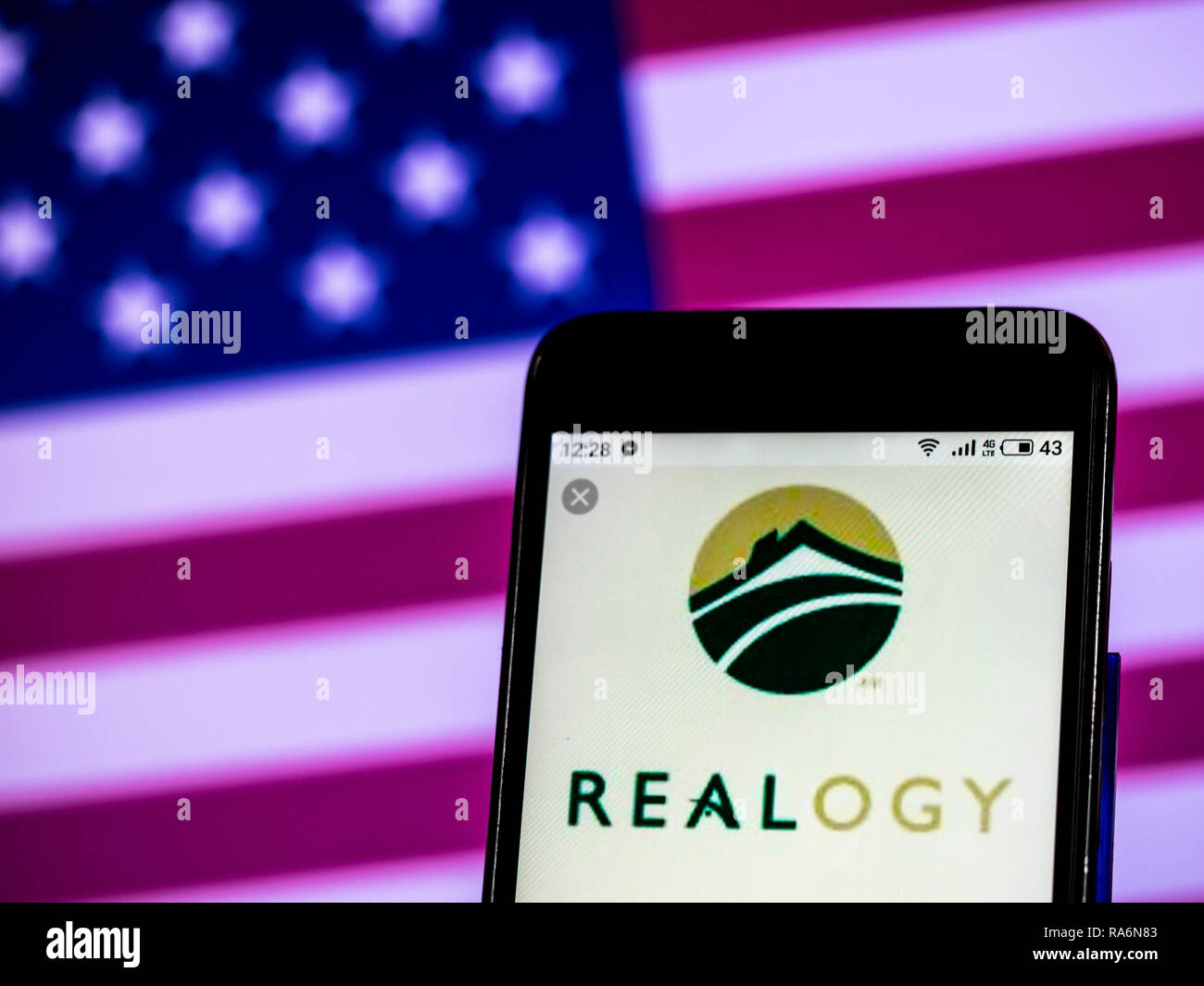 Realogy Real estate company logo seen displayed on smart phone Stock ...